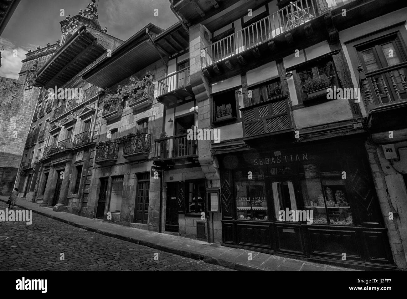 Black and white image of facades of medieval houses in Hondarribia ...