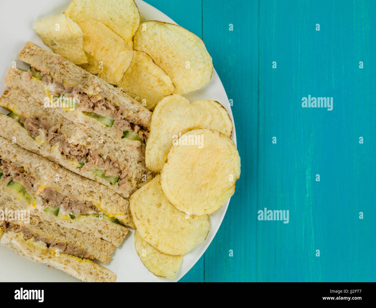 Tuna Sweetcorn and Cucumber Oatmeal Bread Sandwich With Potato Crisps ...