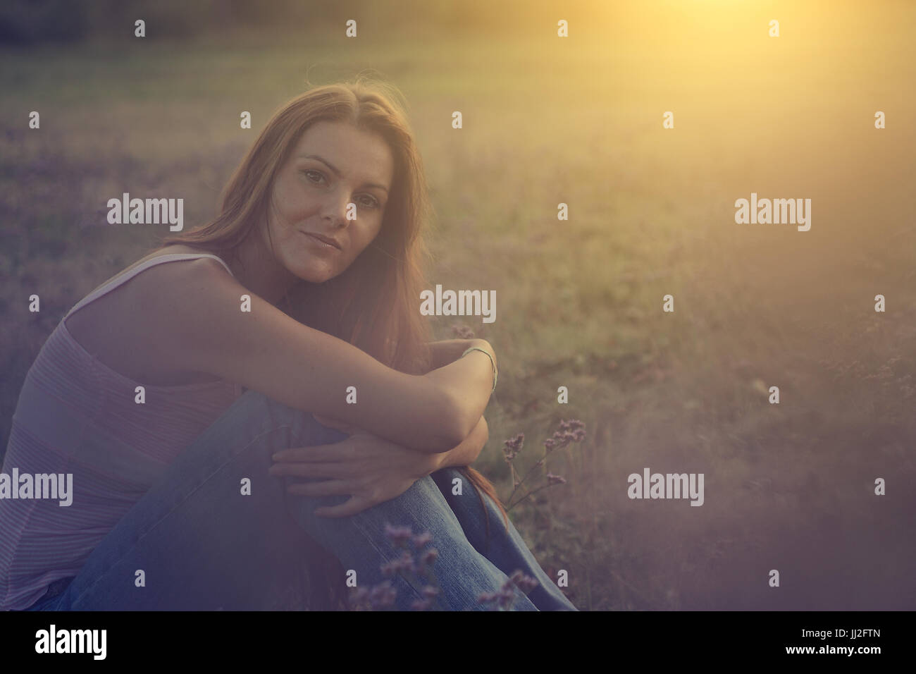 Sad woman in the nature Stock Photo - Alamy