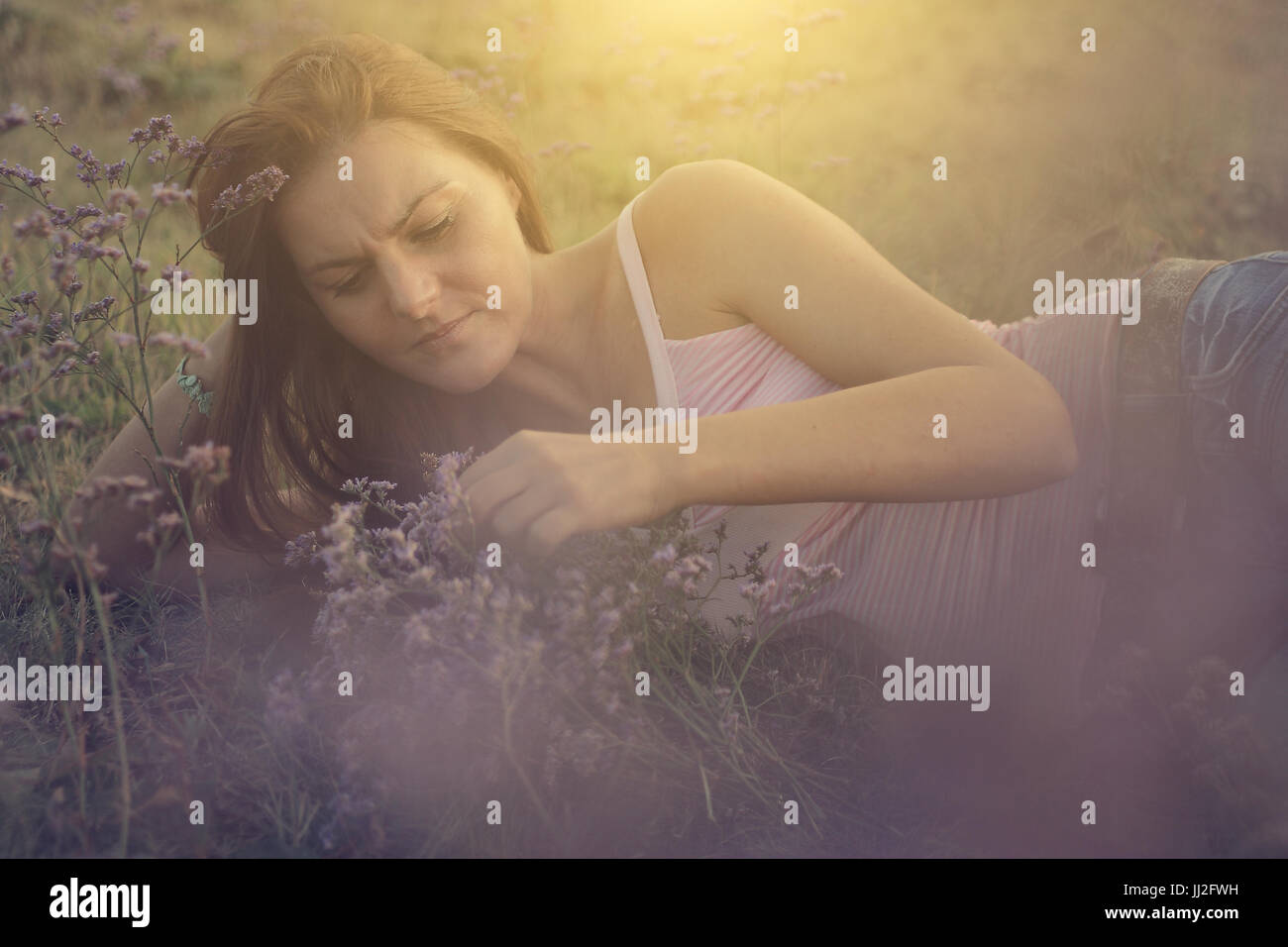 Sad woman in the nature Stock Photo - Alamy