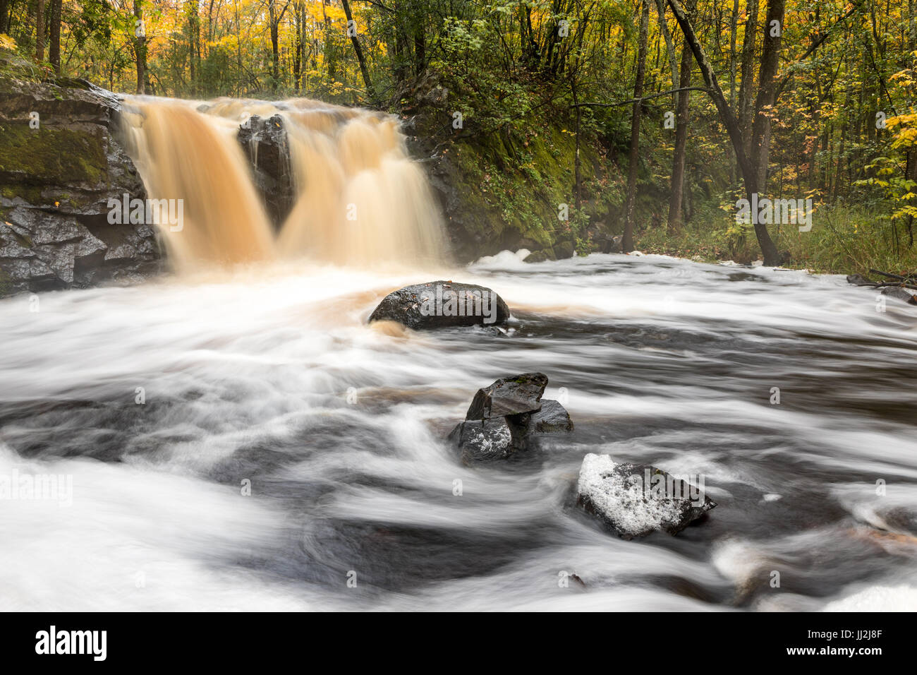 Root Beer Falls in Michigan's Upper Peninsula flows with tannin colored ...