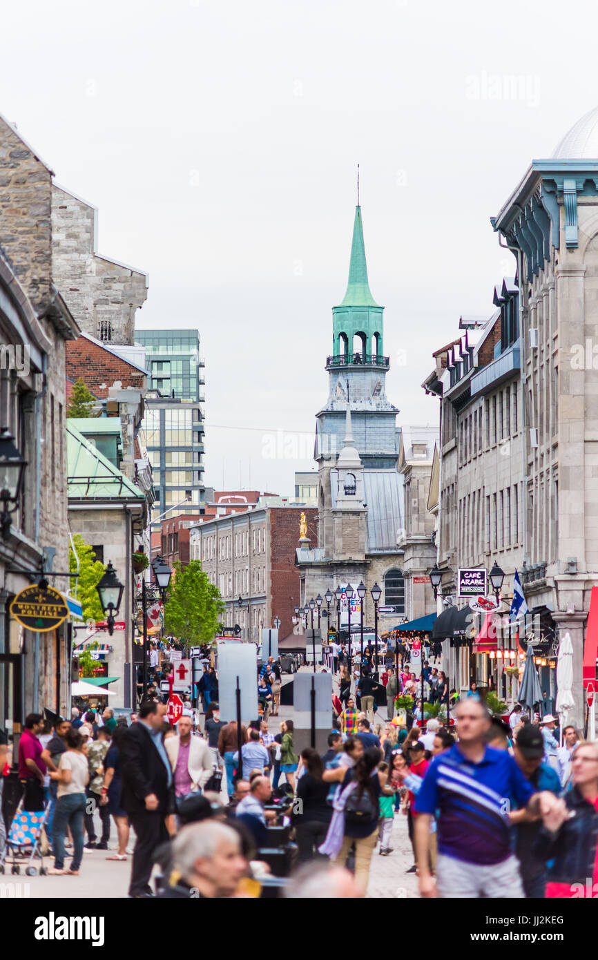 Montreal, Canada - May 27, 2017: Old town area with people walking up ...