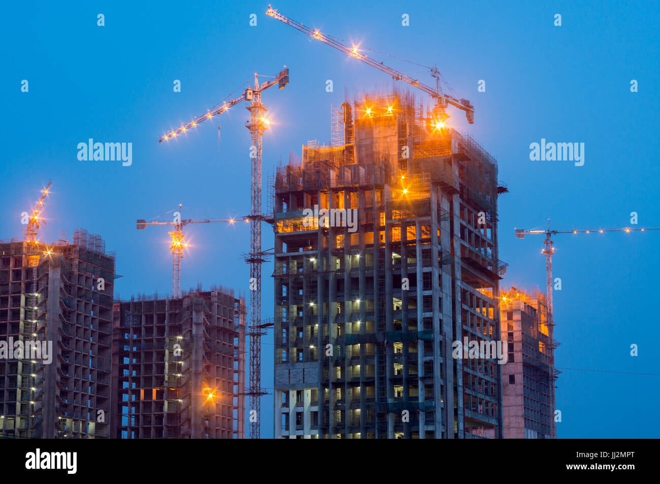 Construction work on building at night Stock Photo - Alamy