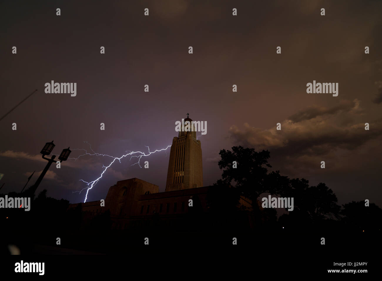 A bolt of lightning appears to emerge from behind the Nebraska State ...