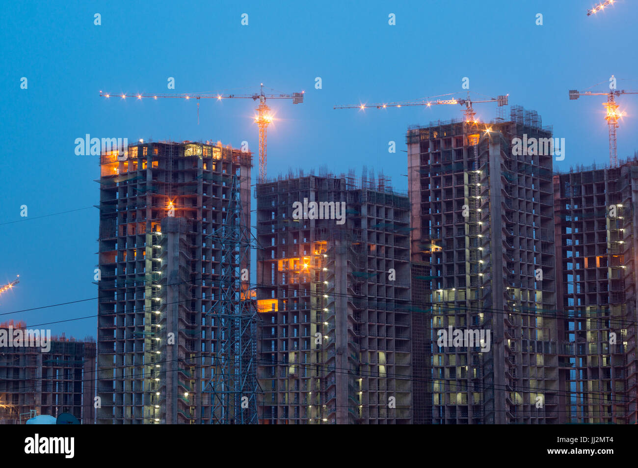 Construction work on building at night Stock Photo - Alamy