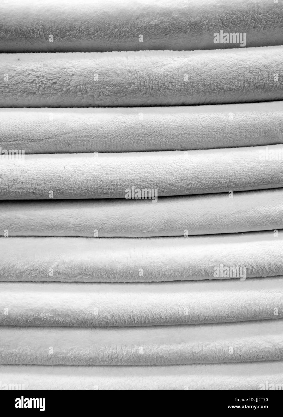 A stack of fresh white towels Stock Photo - Alamy