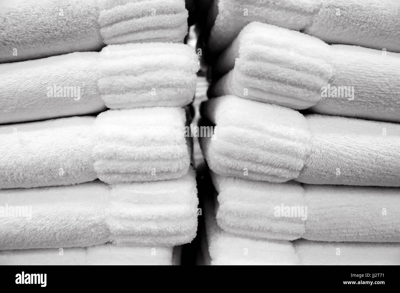A stack of fresh white towels Stock Photo - Alamy