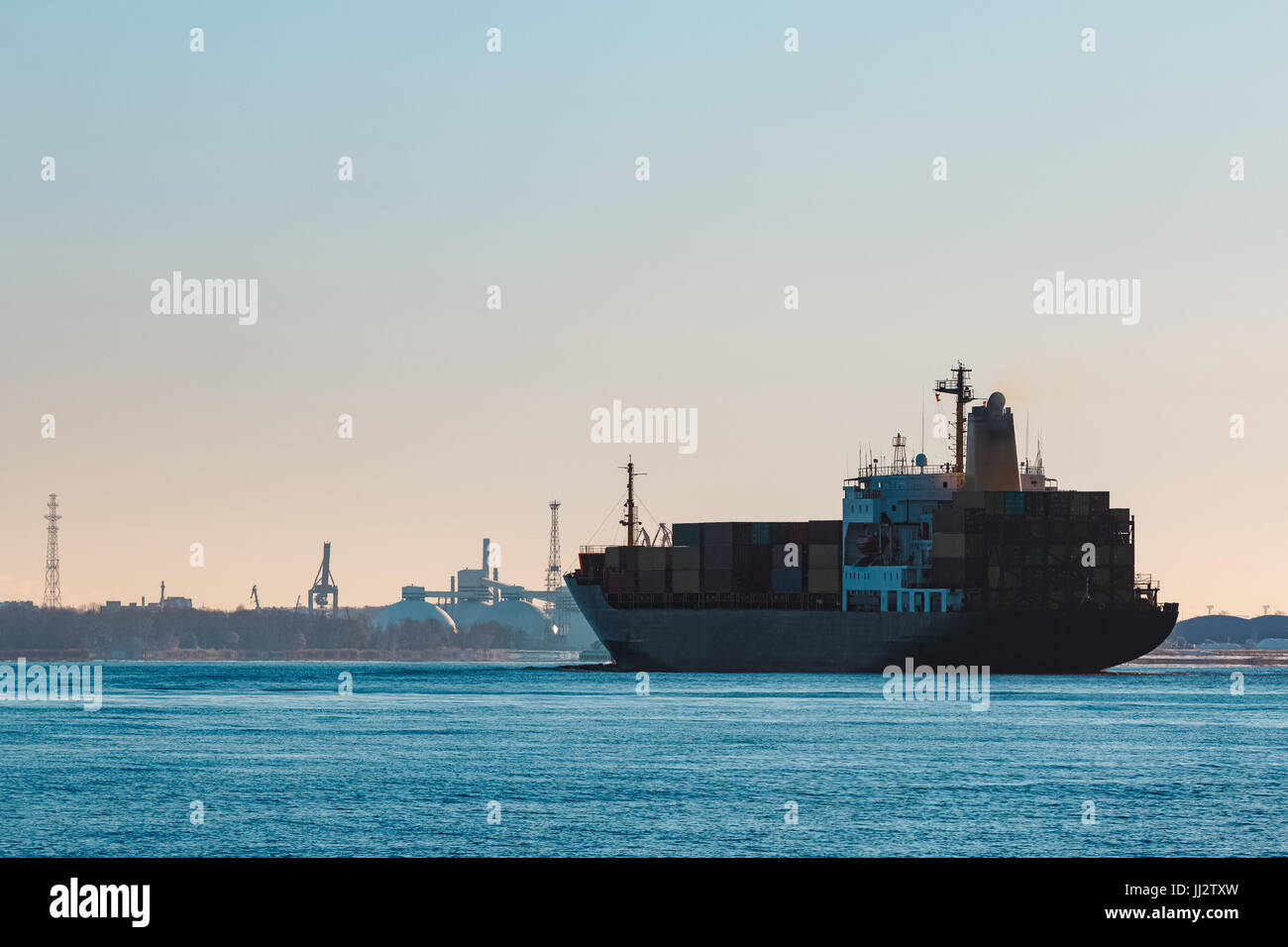 Modern black container ship moving from Baltic sea Stock Photo - Alamy