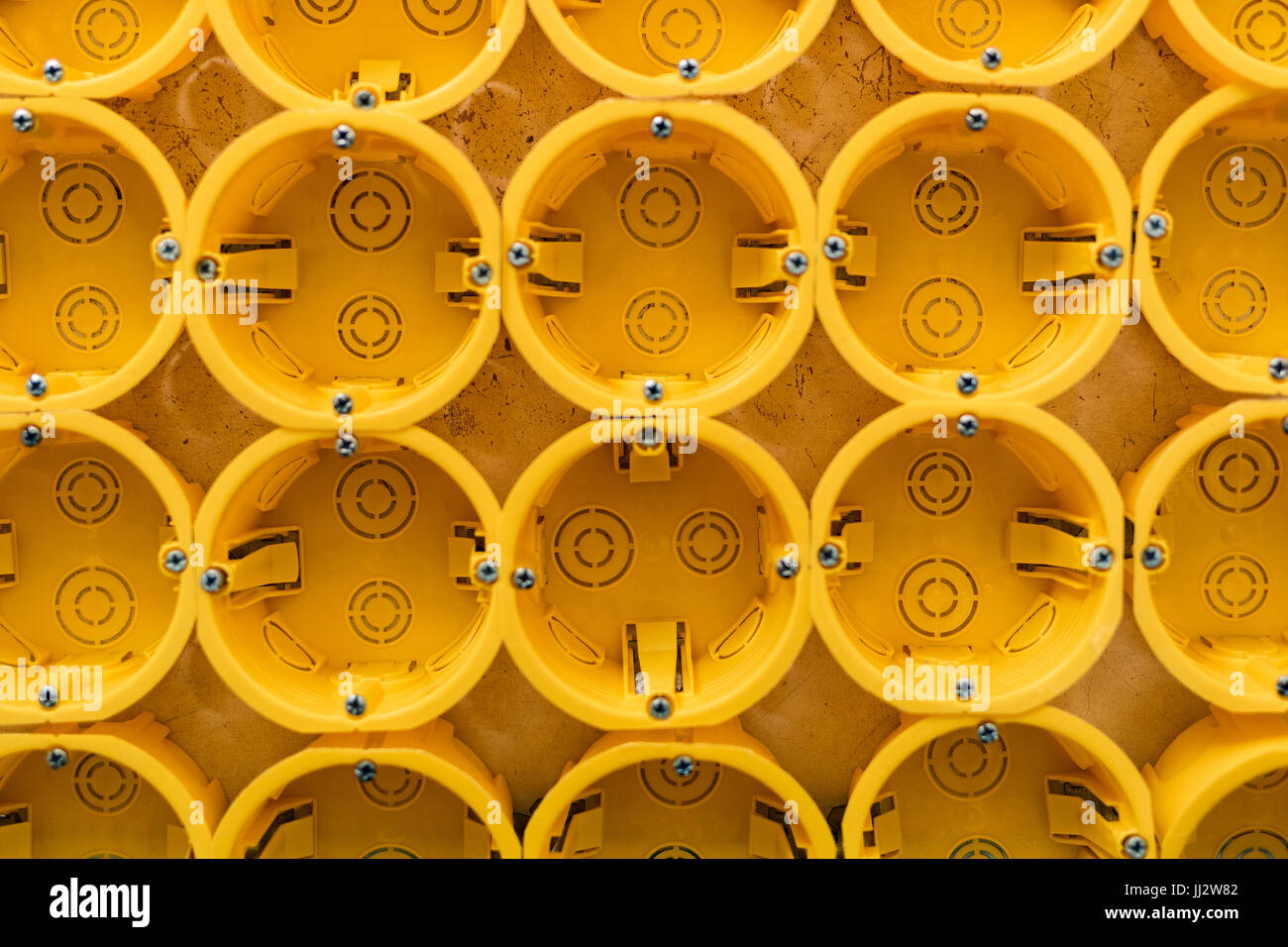 Yellow power sockets Stock Photo - Alamy