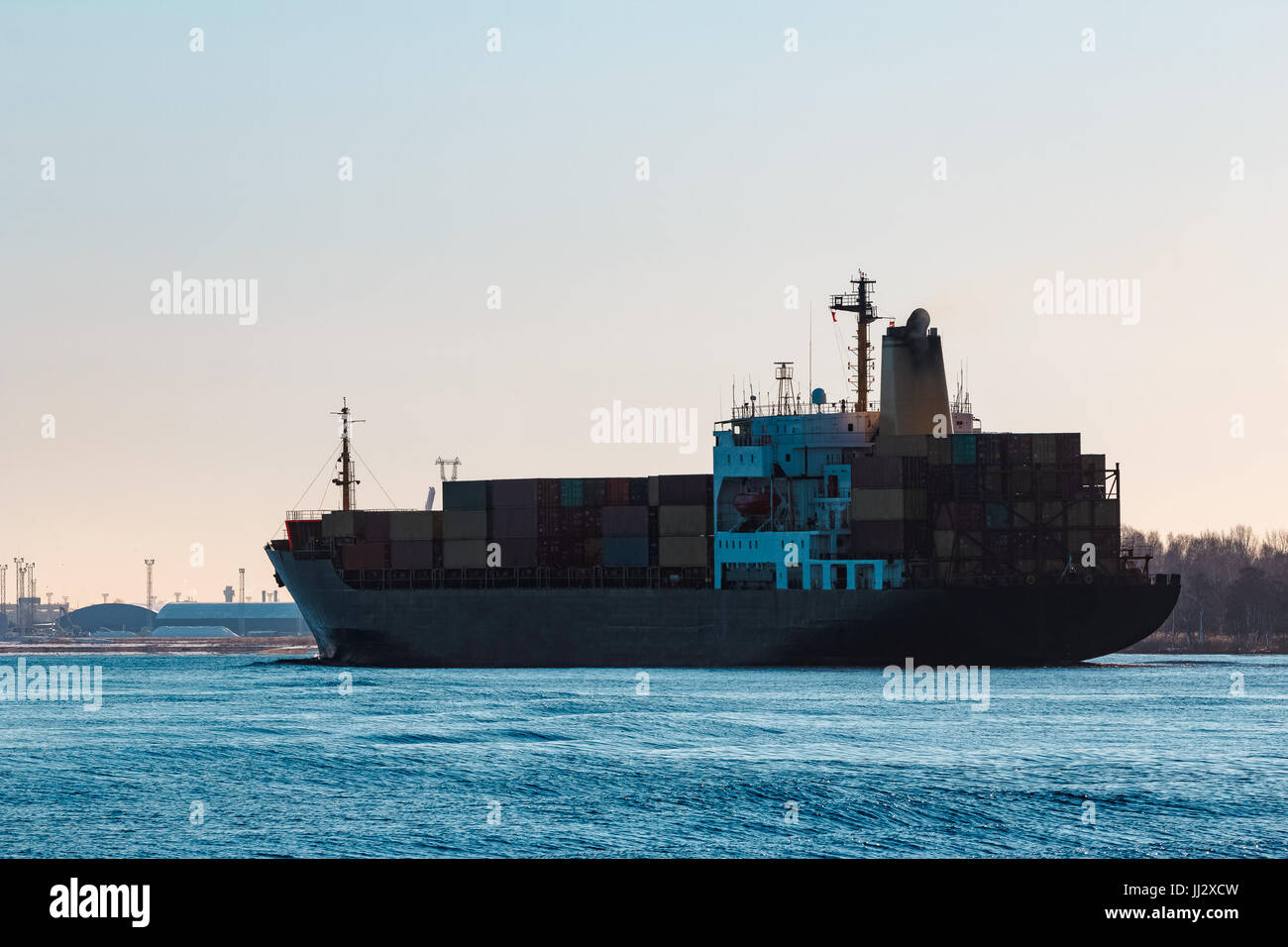 Modern black container ship moving from Baltic sea Stock Photo - Alamy