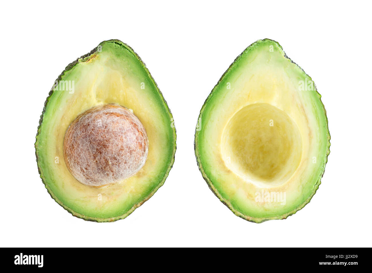 Two slices of avocado . One slice with core Stock Photo - Alamy