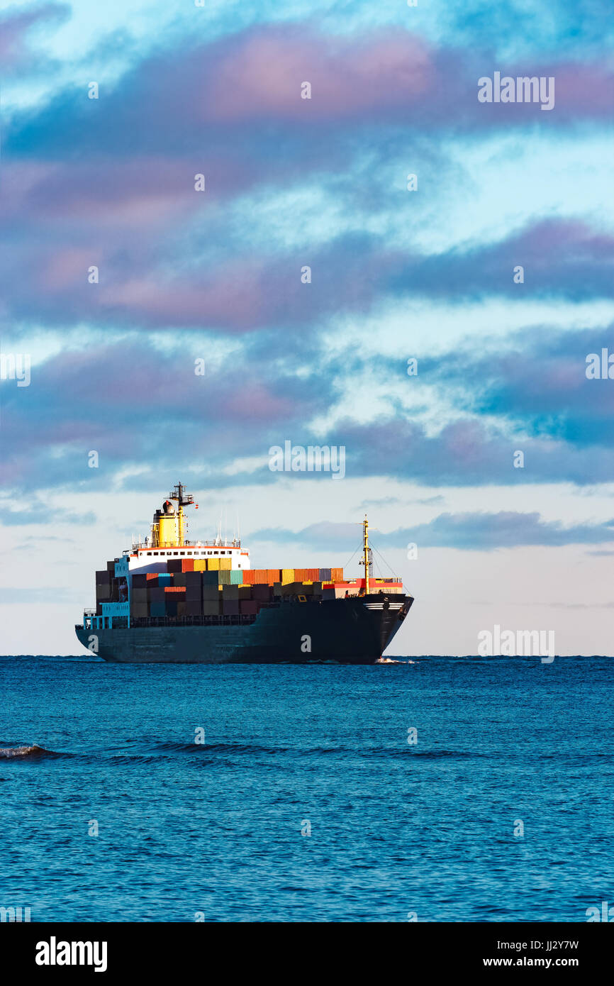 Modern black container ship moving from Baltic sea Stock Photo - Alamy