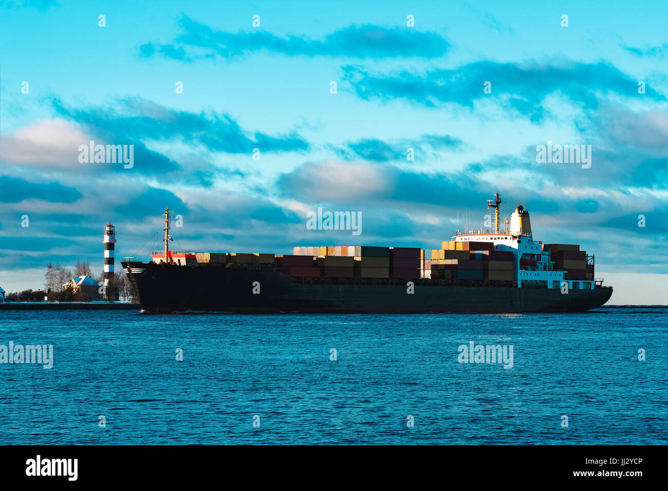 Modern black container ship moving from Baltic sea Stock Photo - Alamy
