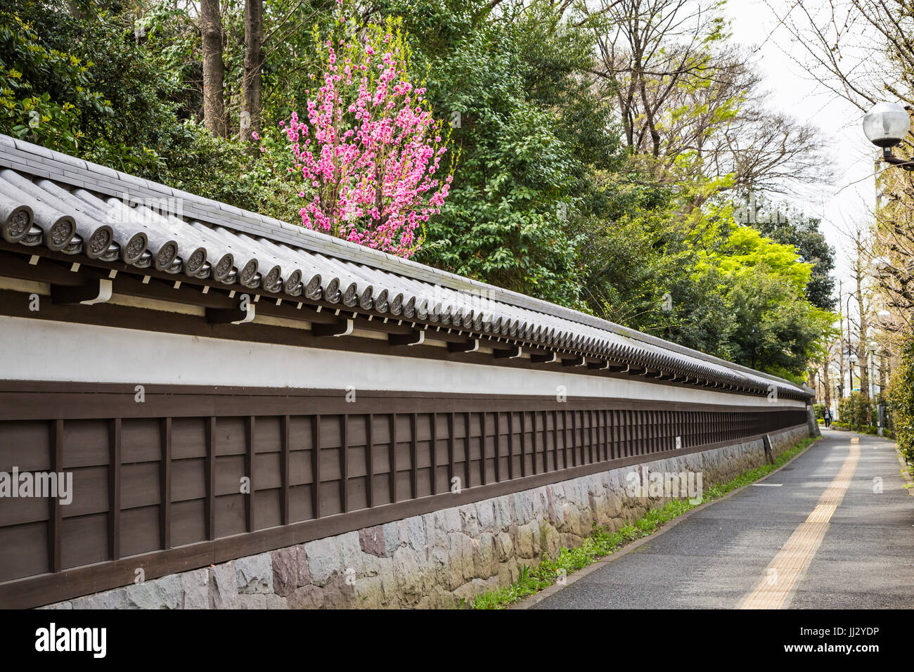 A long fence surrounding the Koishikawa Kōrakuen Gardens in Bunkyo ...