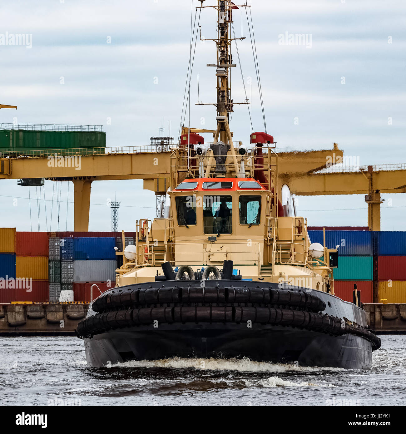 Tug ship in the cargo port of Riga, Europe Stock Photo - Alamy