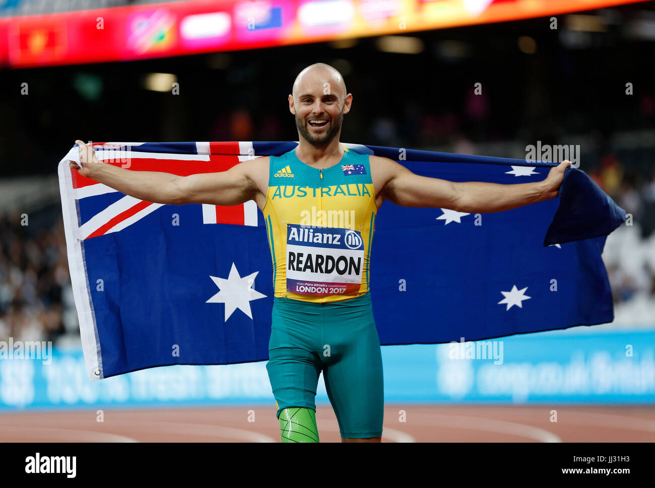 Australia's Scott Reardon celebrates winning gold in the Men's 100m T42 ...