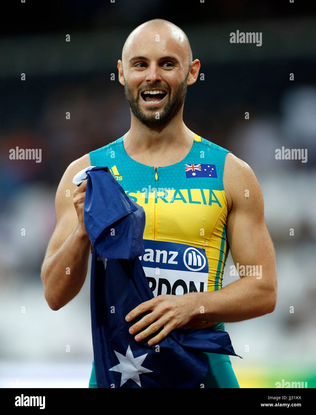 Australia's Scott Reardon celebrates winning gold in the Men's 100m T42 ...