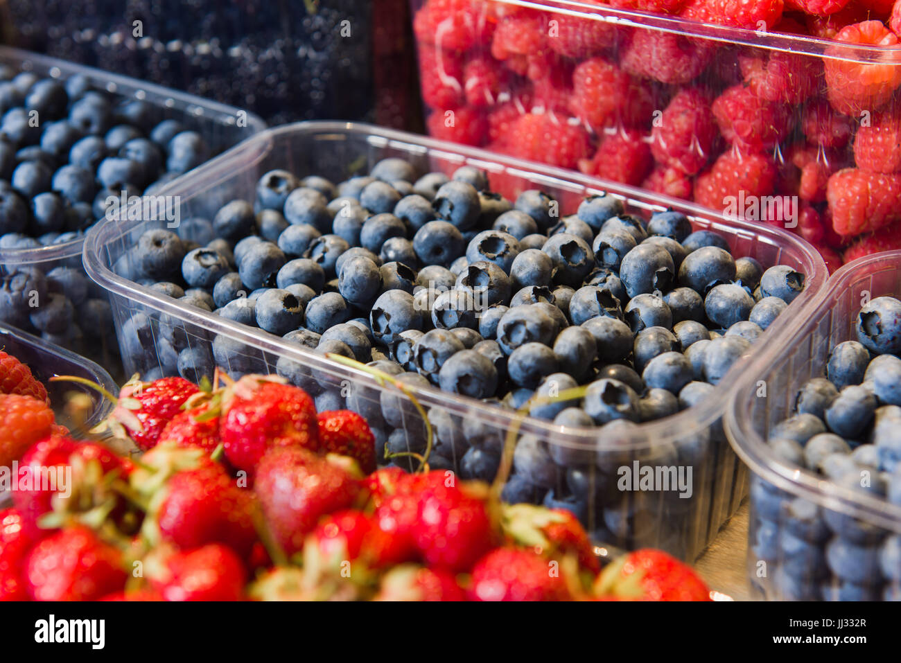 Fresh berries on display. Organic and fresh. Food background. Display ...