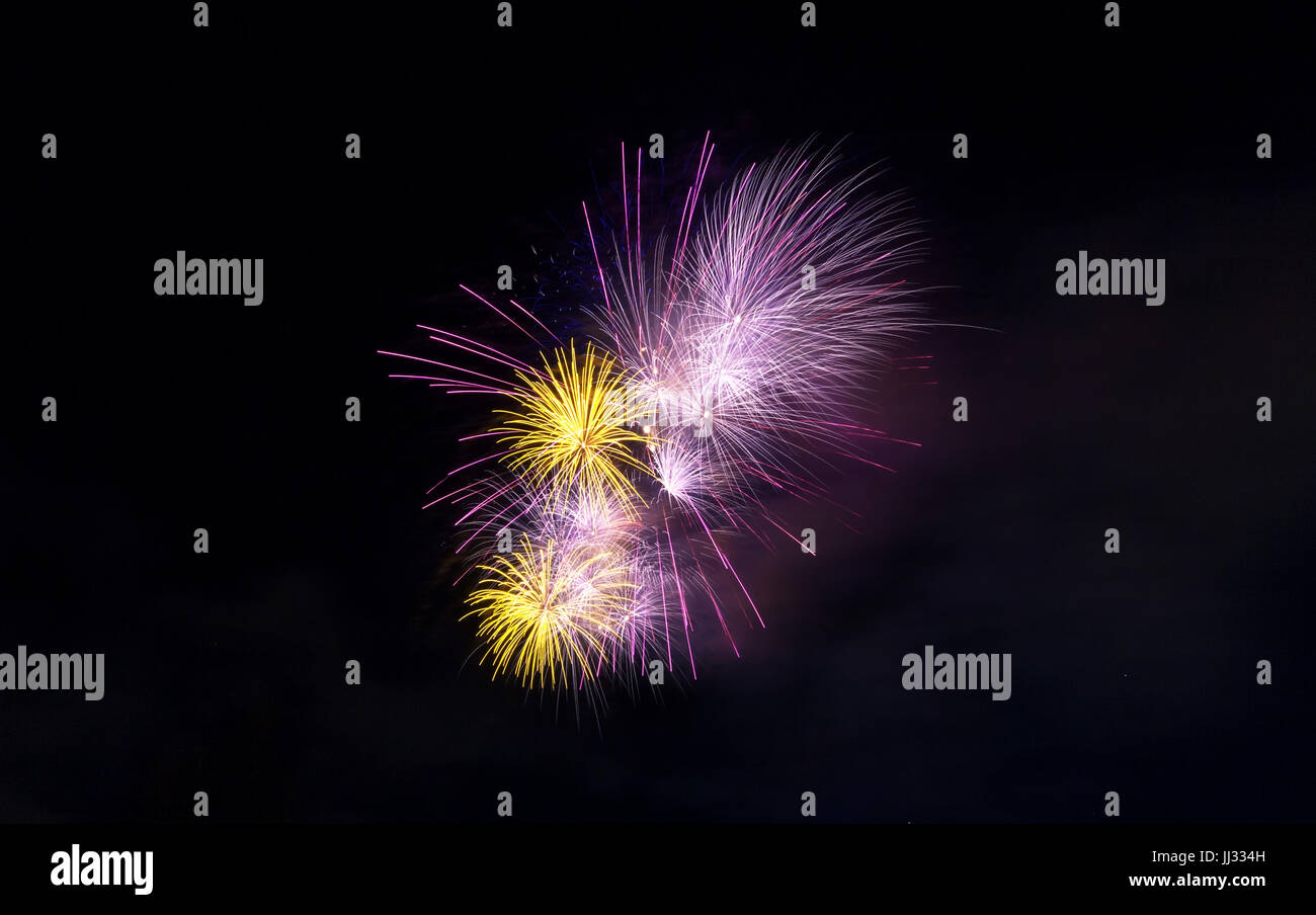 Fireworks light up close-up against dark sky Stock Photo - Alamy