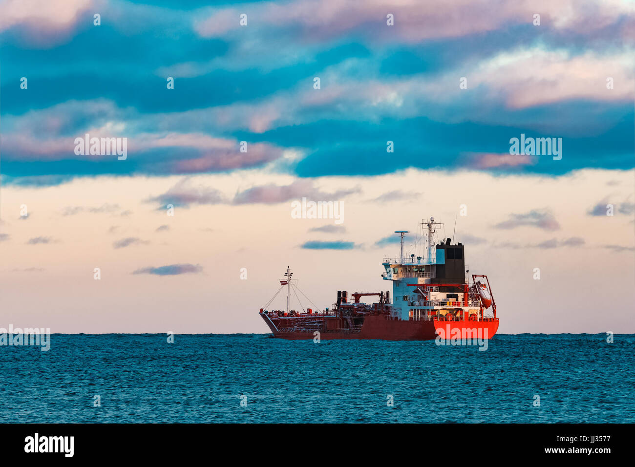 Red cargo oil tanker moving to Baltic sea Stock Photo - Alamy