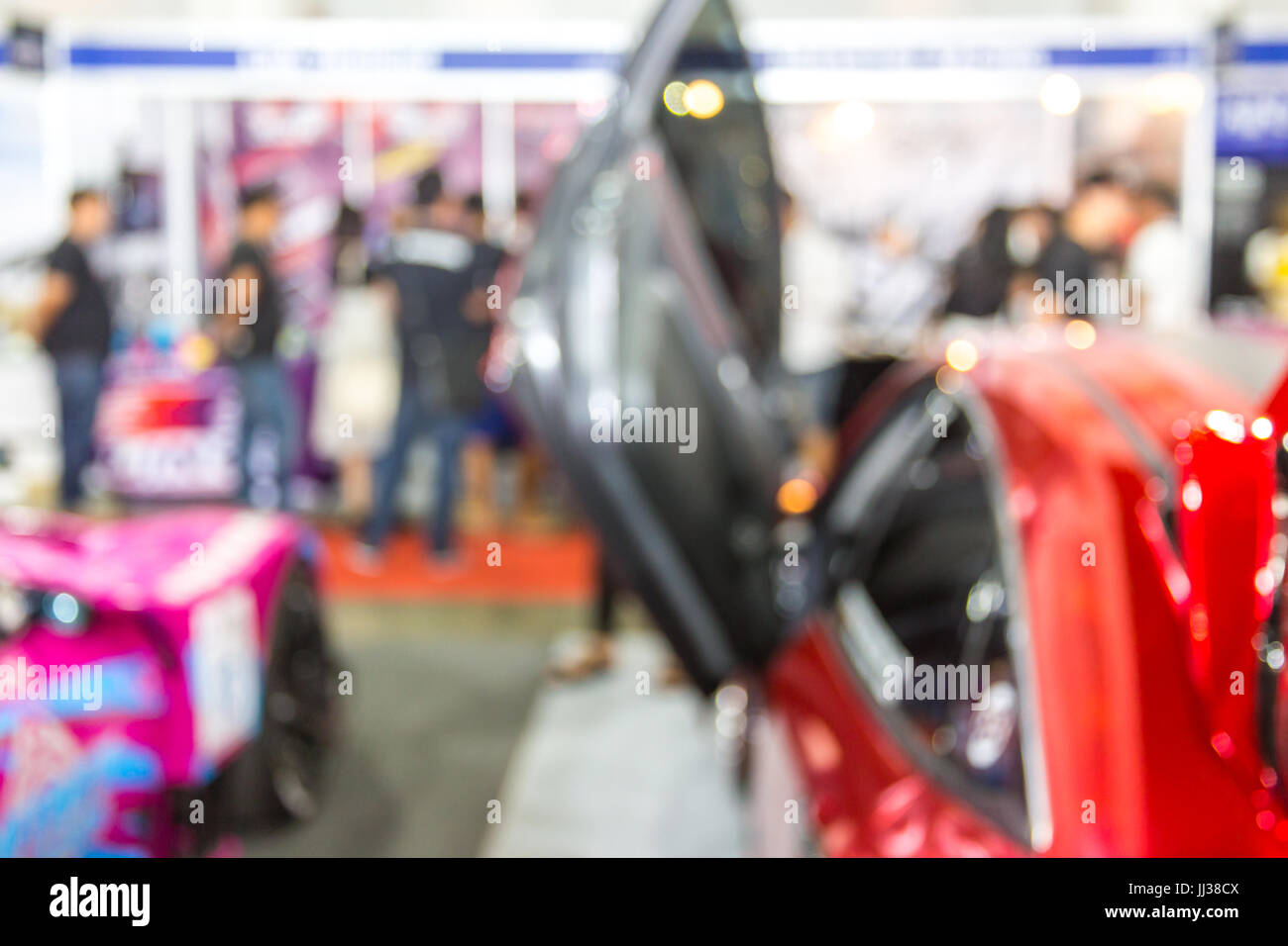 blured Modified car with people background Stock Photo - Alamy