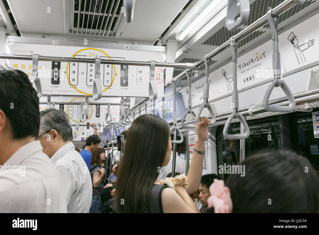 The interior of a subway train decorated with signboards for the new ...