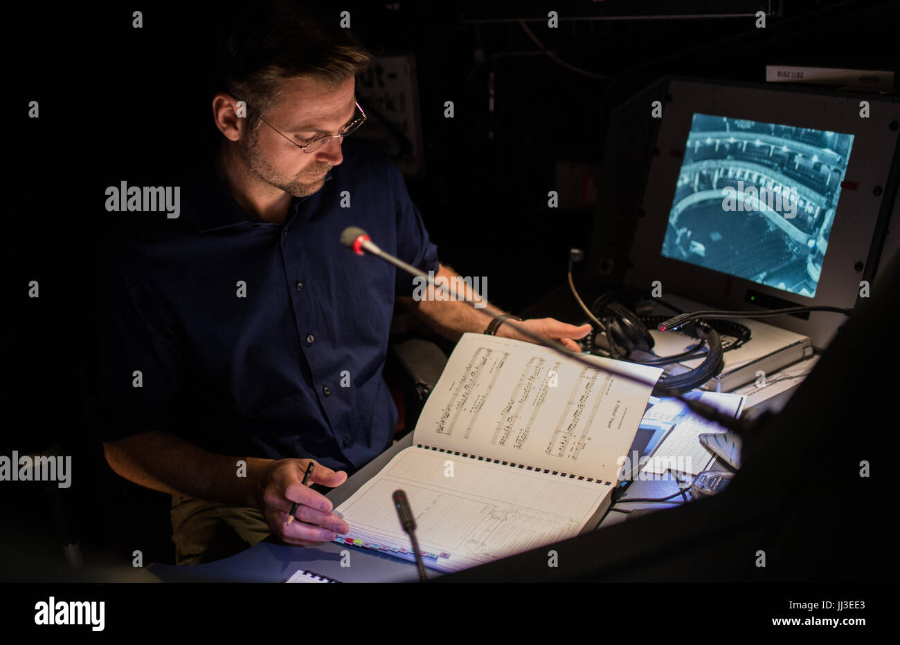 Kenneth Pettitt at his desk in the State Theatre of Hesse in Wiesbaden ...