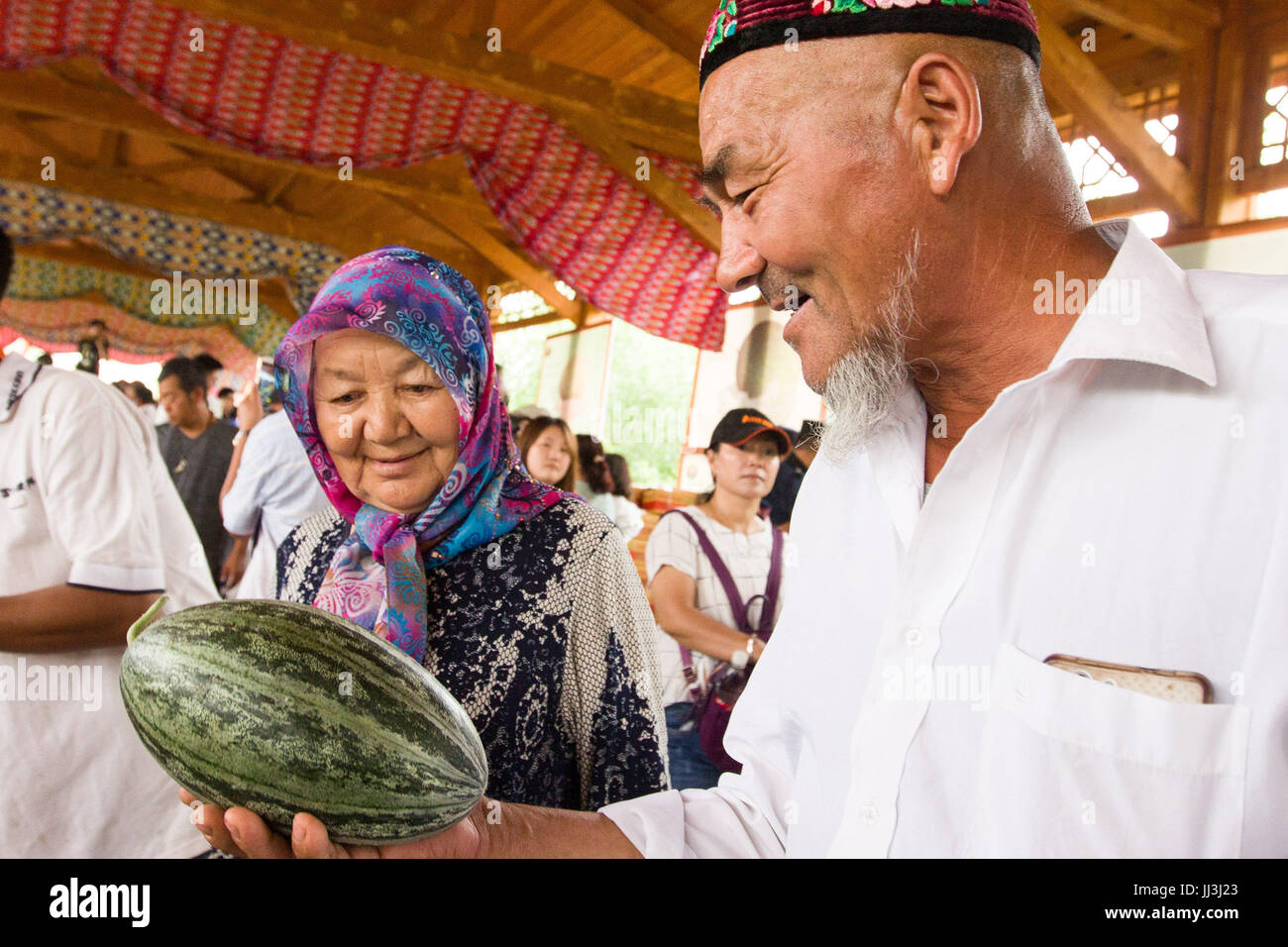 Hami, China's Xinjiang Uygur Autonomous Region. 18th July, 2017. People ...