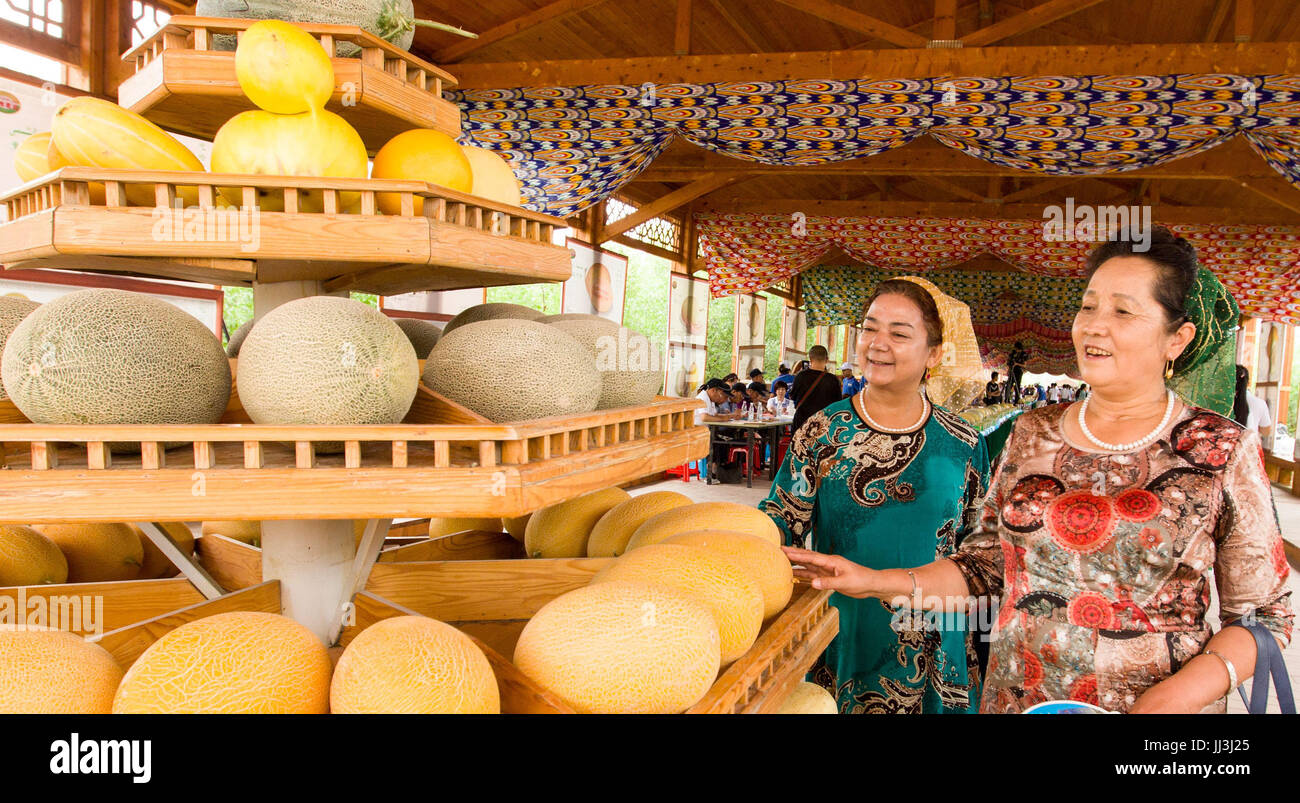 Hami, China's Xinjiang Uygur Autonomous Region. 18th July, 2017. People ...