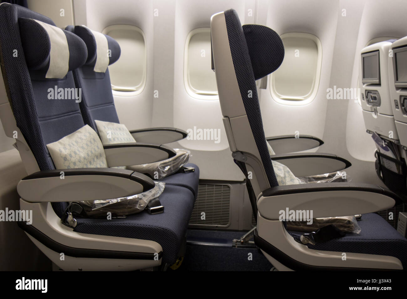 Empty seat rows on the plane. Airplane without a passenger. The board ...