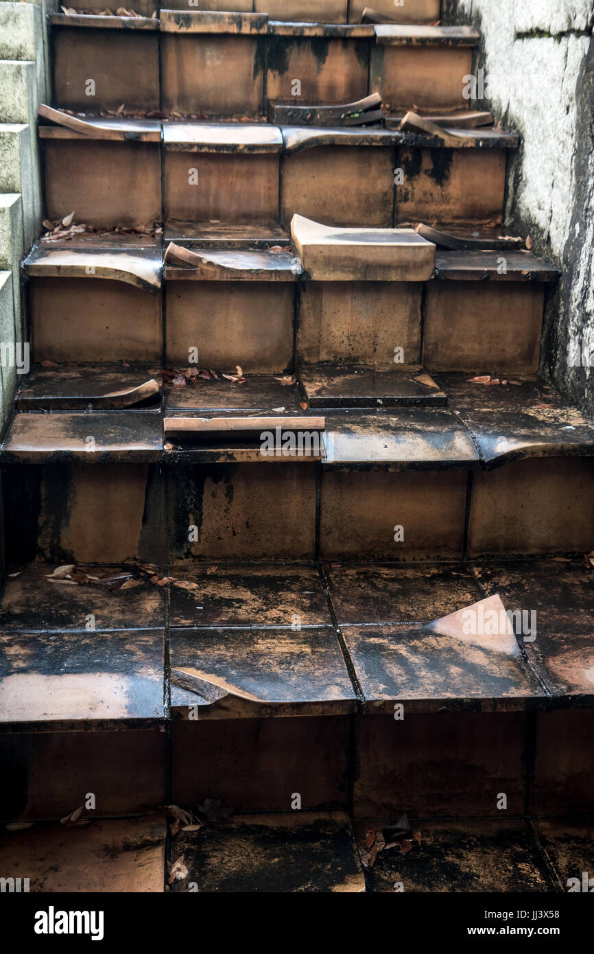 Damaged stairs from tiles Stock Photo - Alamy