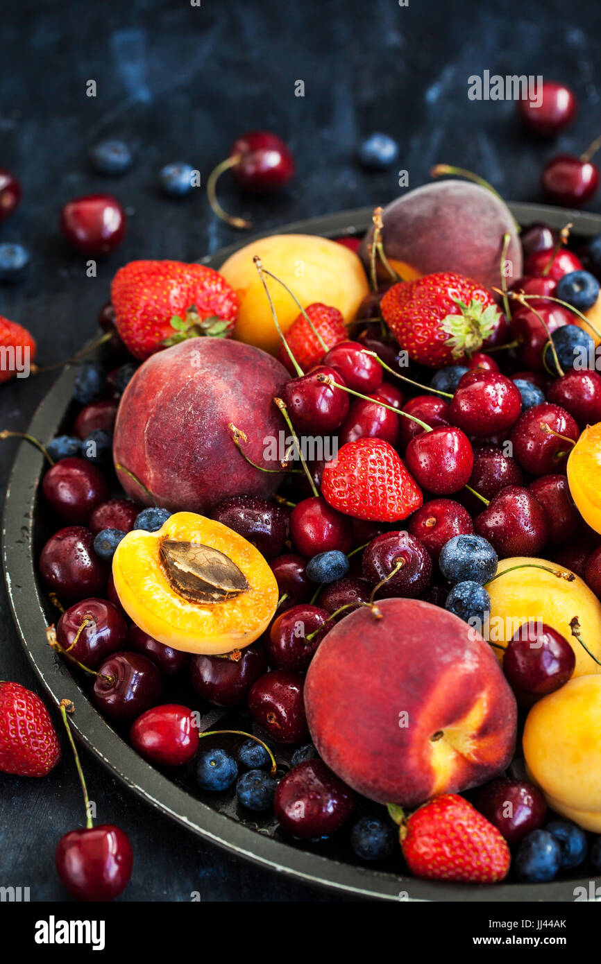 Fresh Ripe Summer Berries And Fruits Peaches Apricots Cherries And