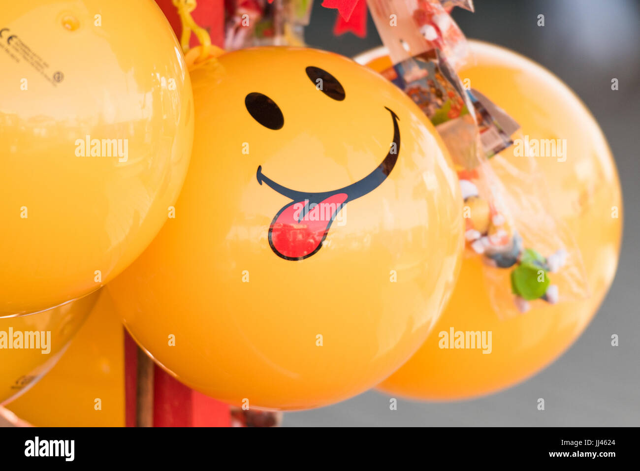 yellow ball with funny face Stock Photo - Alamy