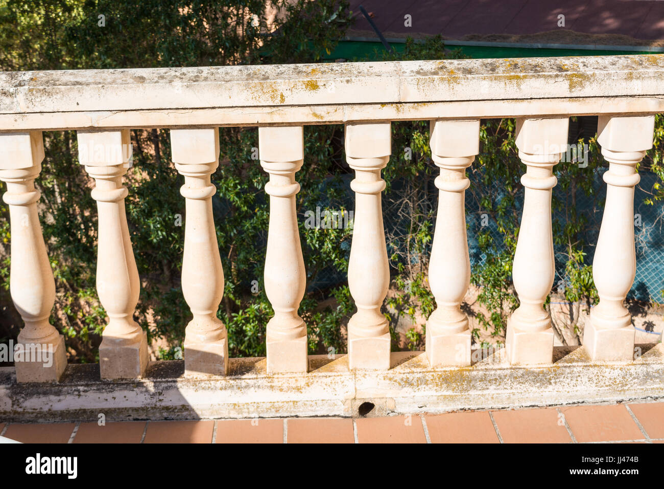 Old balustrades on a balcony Stock Photo - Alamy
