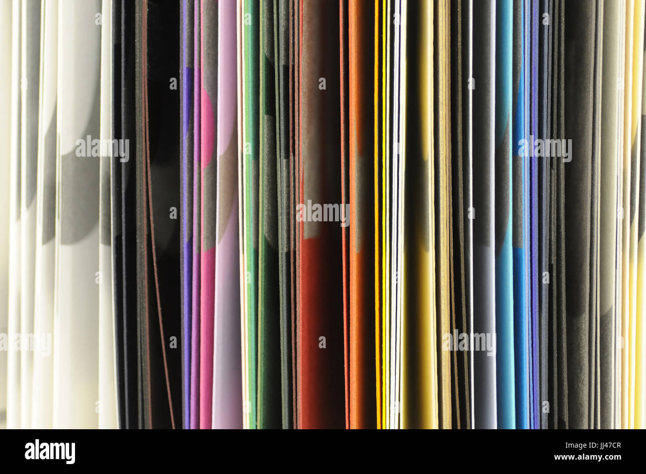 vertical edges of coloured paper samples in a swatch book Stock Photo ...