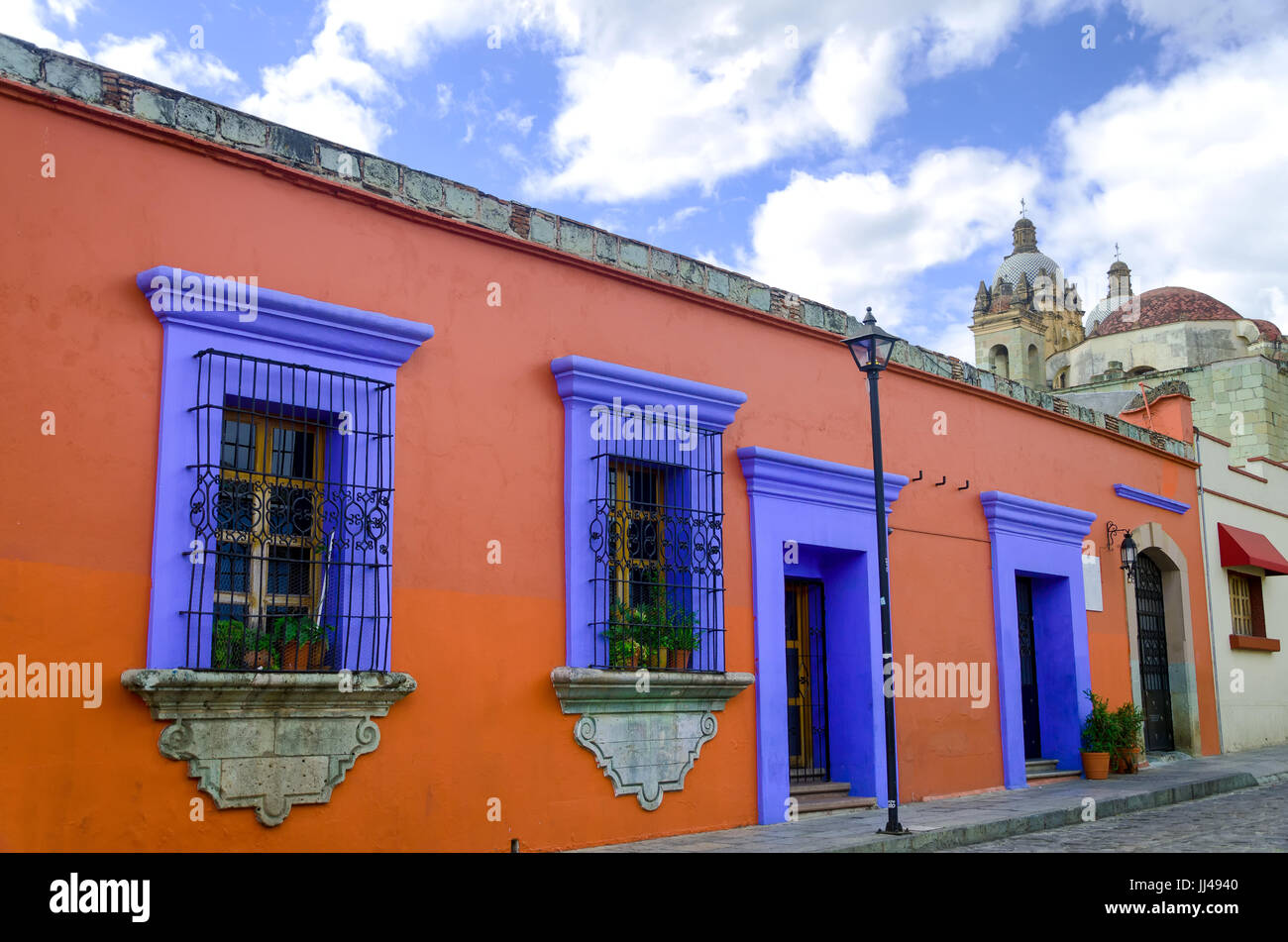 Colorful colonial street and church in Oaxaca, Mexico Stock Photo - Alamy