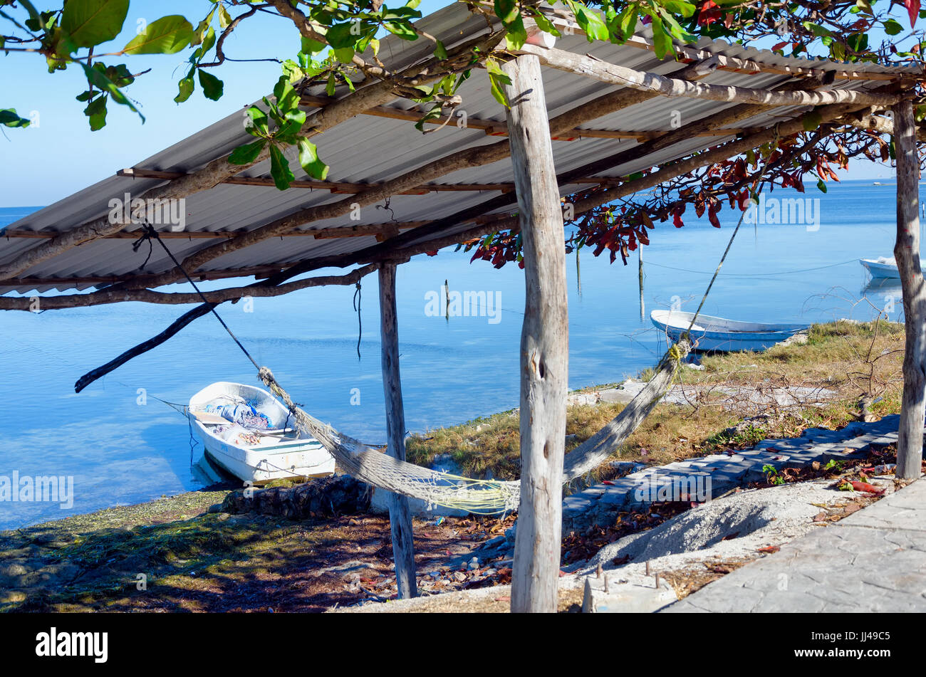 View of a pier and boats in the town of Champoton, Mexico Stock Photo ...