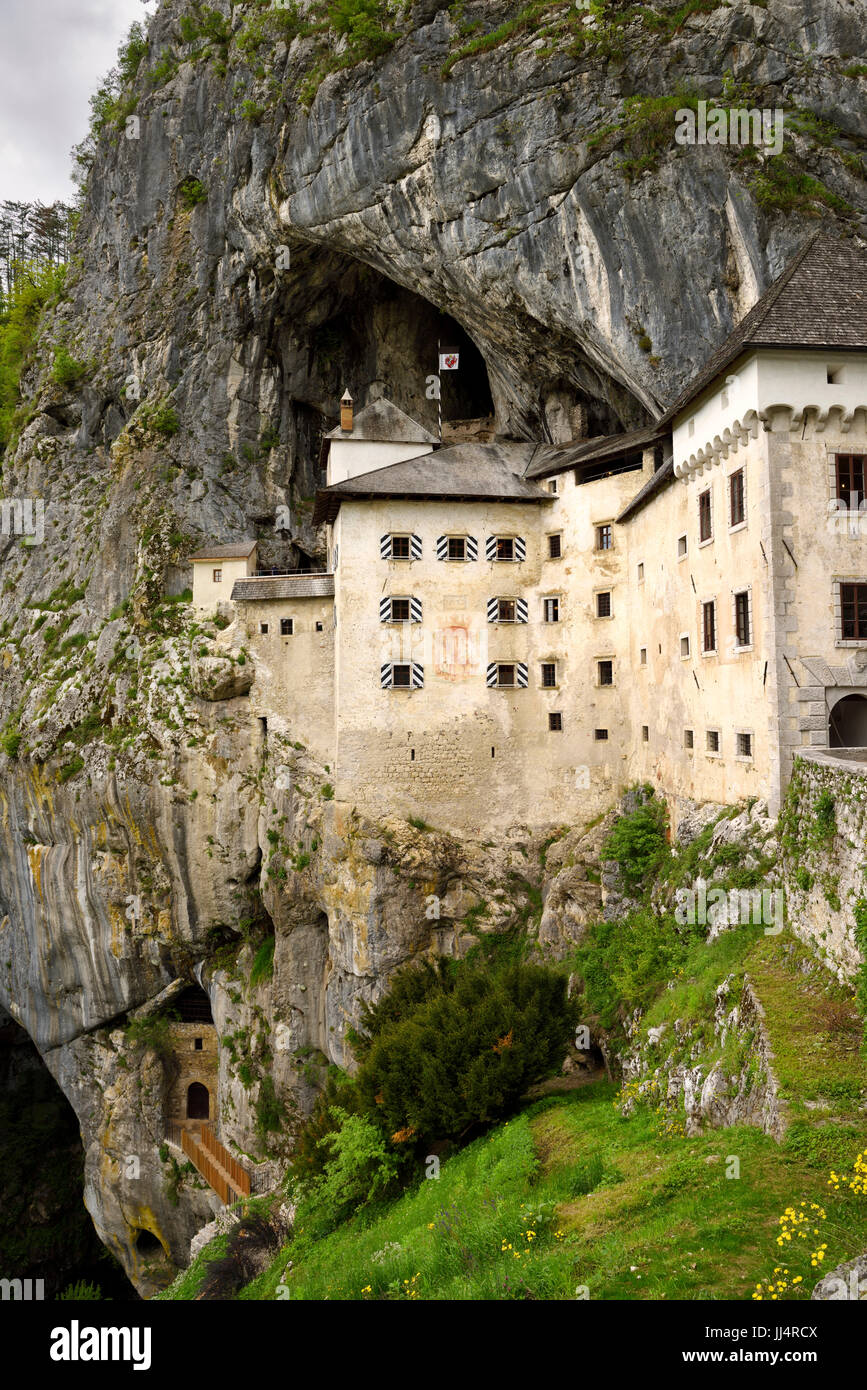 Cliff cave entrances at Predjama Castle 1570 Renaissance fortress built ...