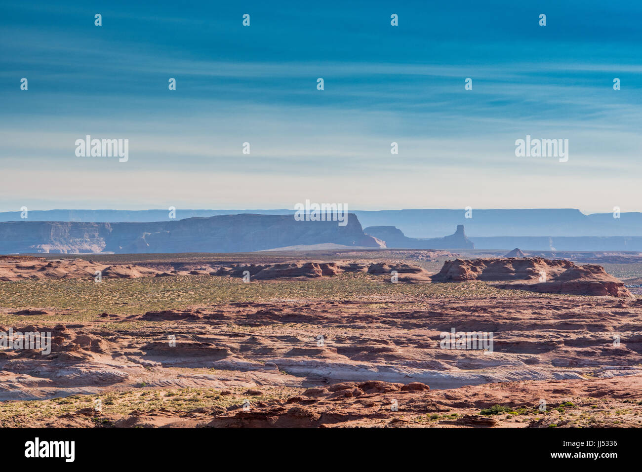 Layers of Desert Ridges behind flat desert terrain Stock Photo - Alamy