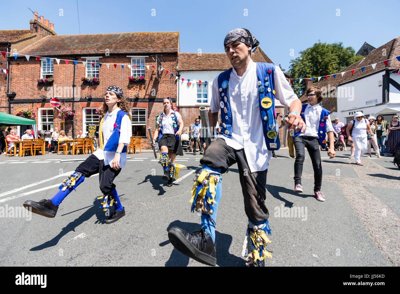 Traditional English folk dancers, Royal Liberty Morris side dancing and ...