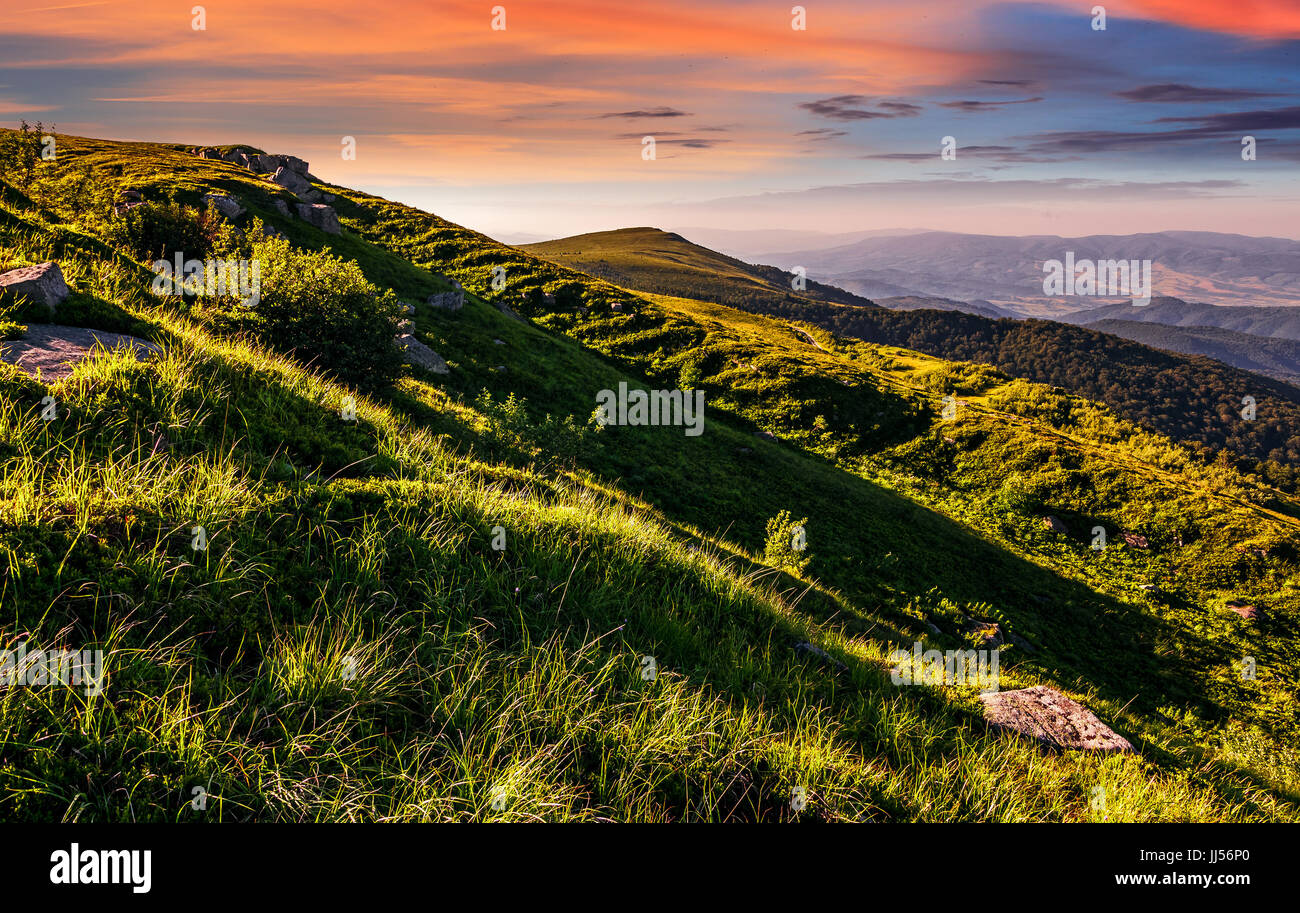 mountain ridge with peak behind the hillside. beautiful summer ...