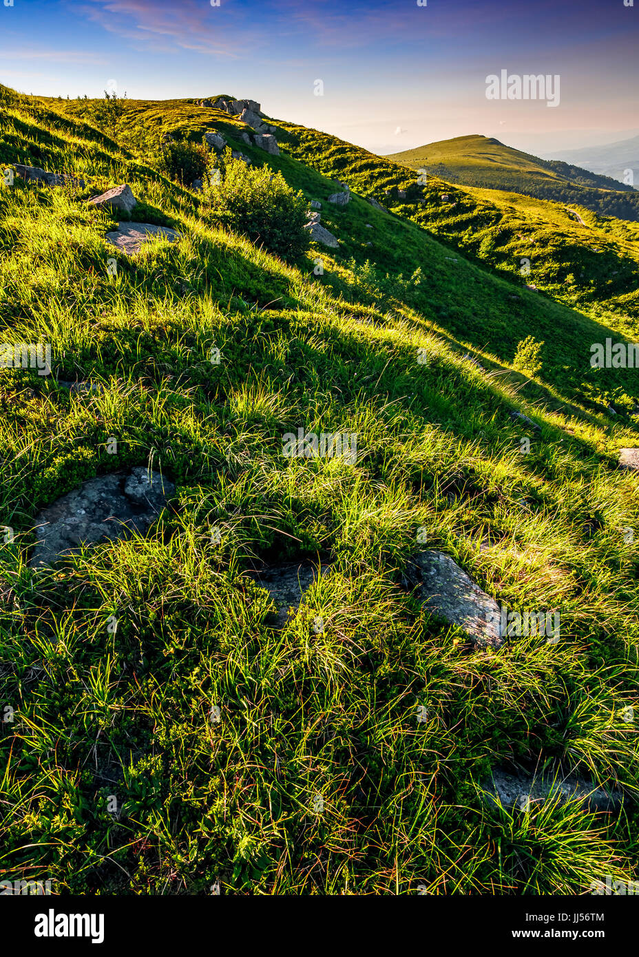 mountain ridge with peak behind the hillside. beautiful summer ...