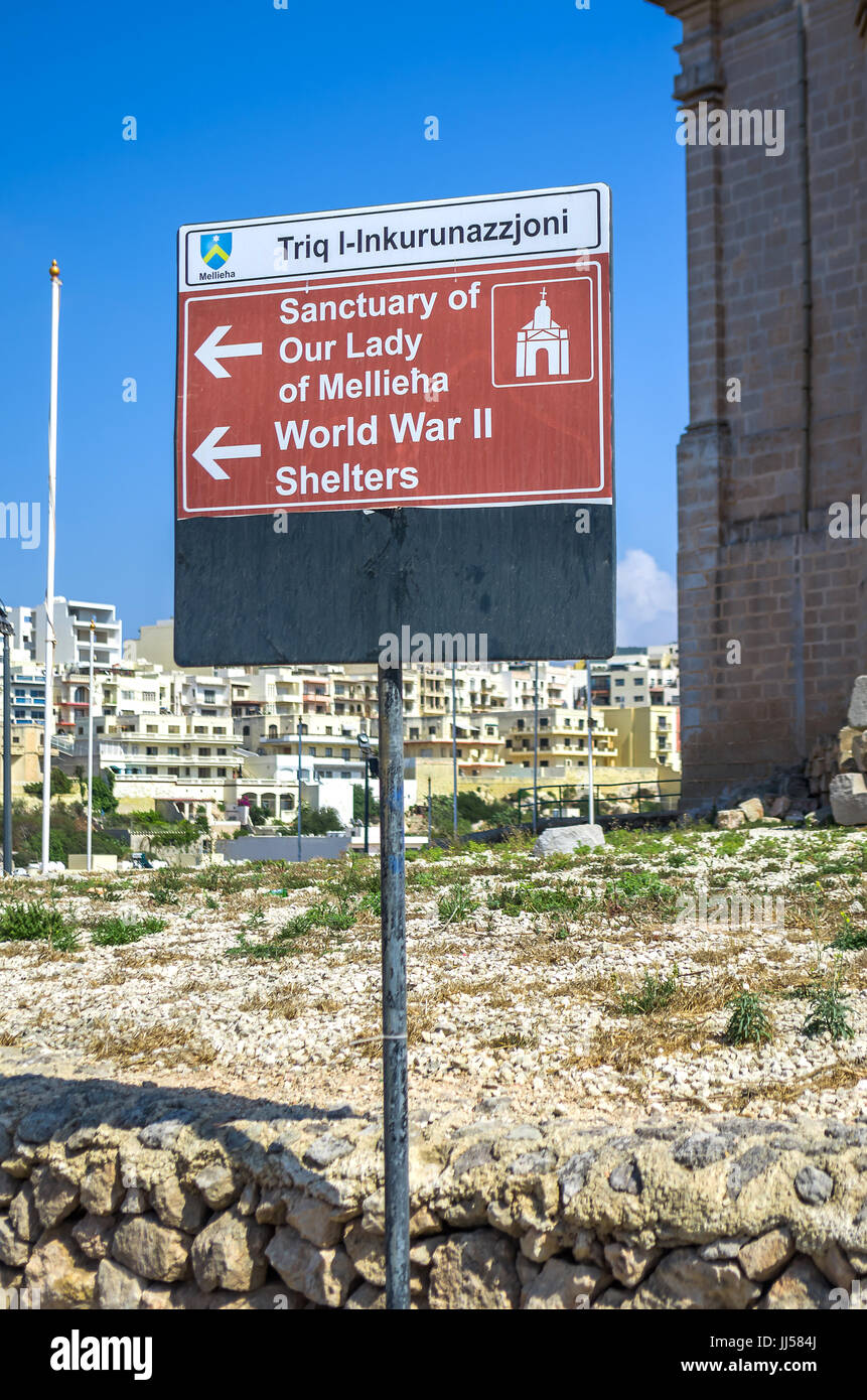 Malta, Mellieha: Typical Maltese street name sign and information sign ...