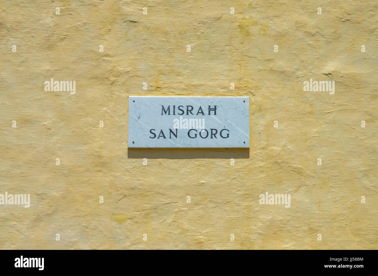 Malta, Valletta: Typical street name plaque mounted on a wall in the ...