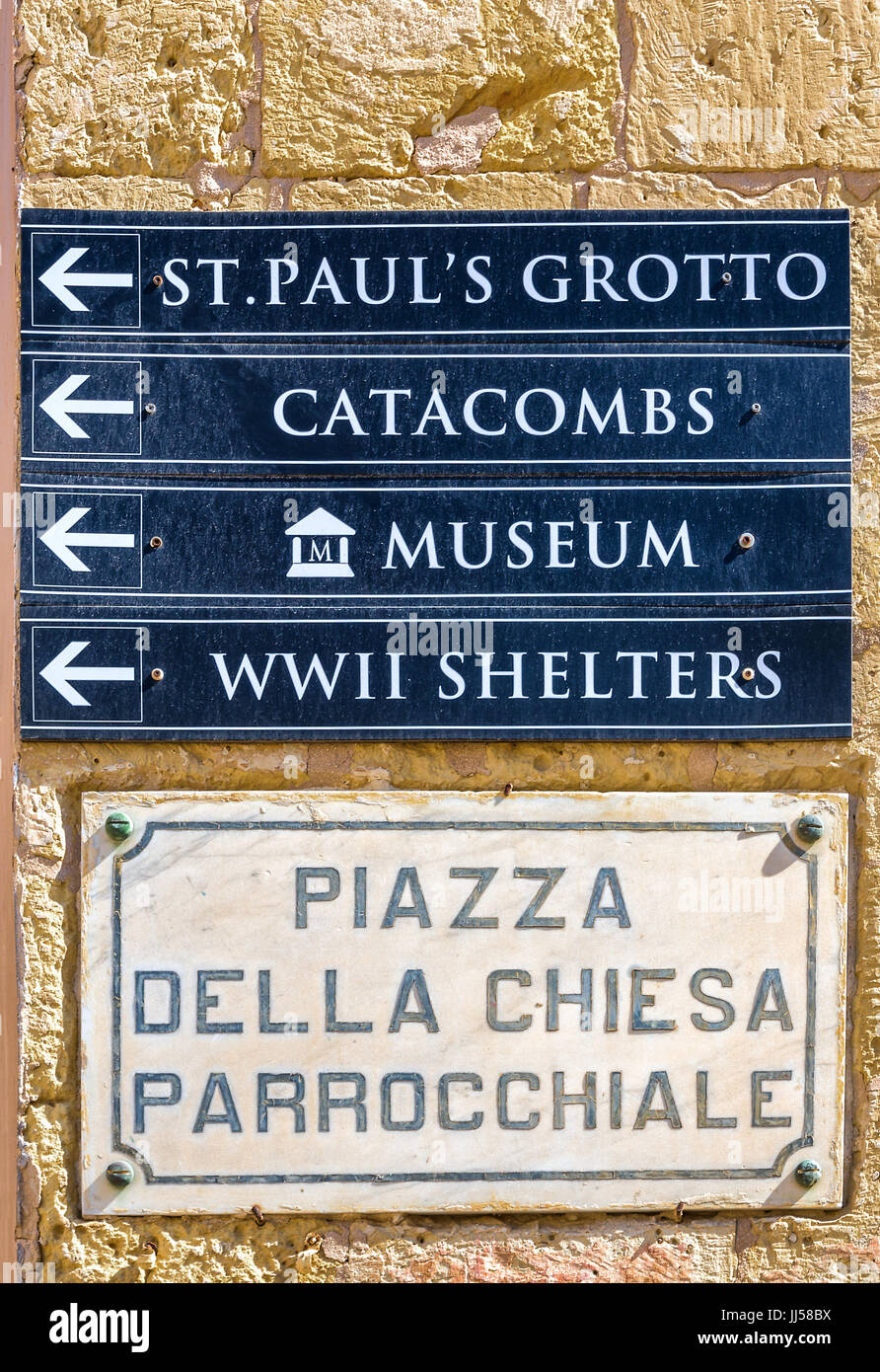 Malta, Rabat: Marble street name sign and information signs showing the ...