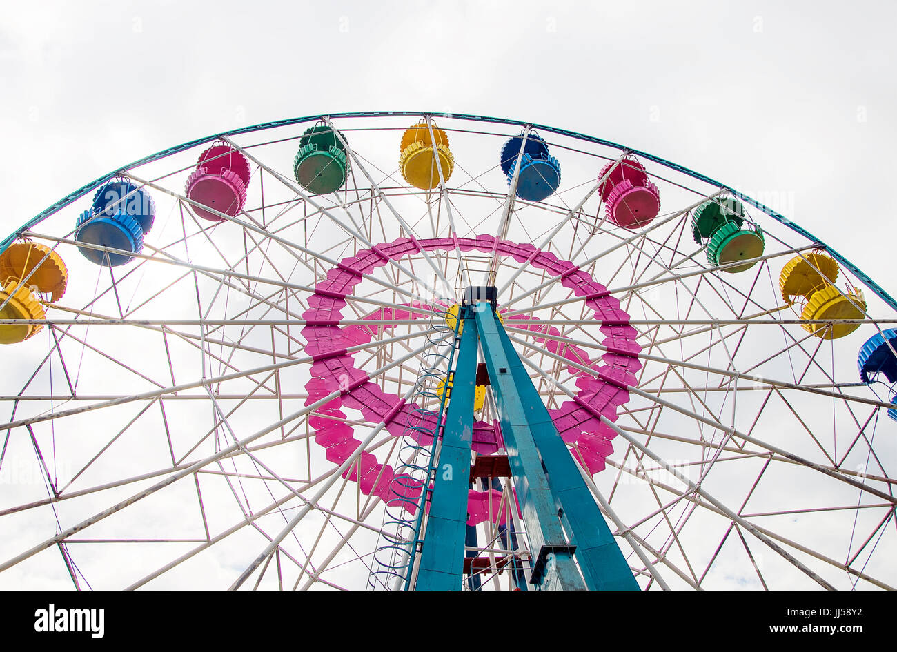 Colorful ferris wheel in the city park Stock Photo - Alamy