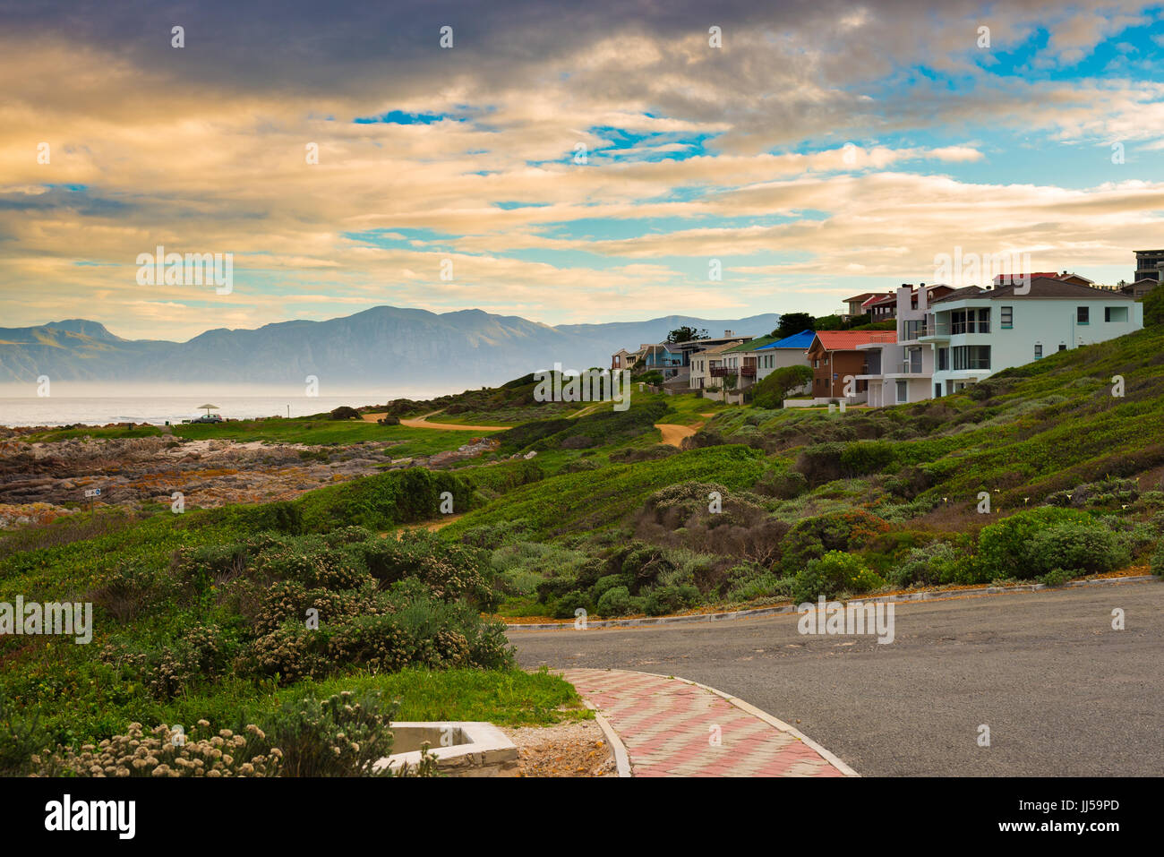 Rocky coast line on the ocean at De Kelders, South Africa, famous for whale watching. Winter ...