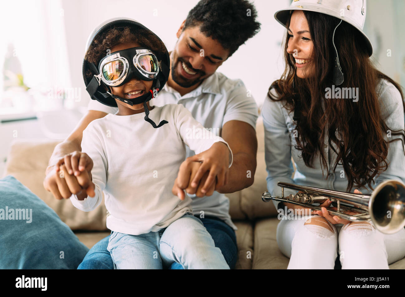Picture of happy family having fun time together Stock Photo - Alamy