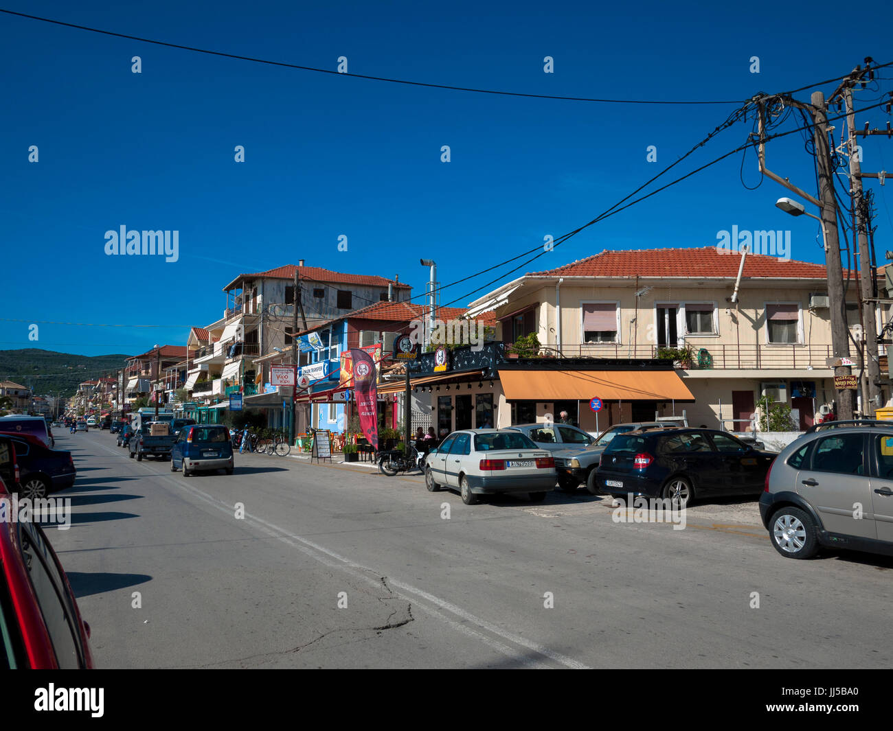 Traffic on the pretty front street of Lefkada town, Lefkas island ...