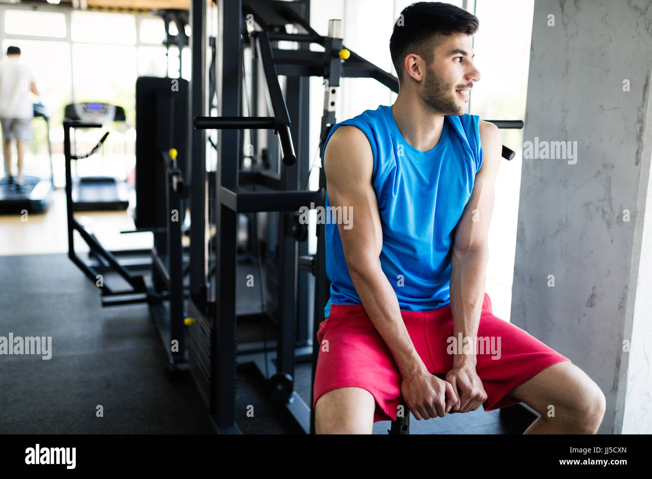 Sitting man gym hi-res stock photography and images - Alamy
